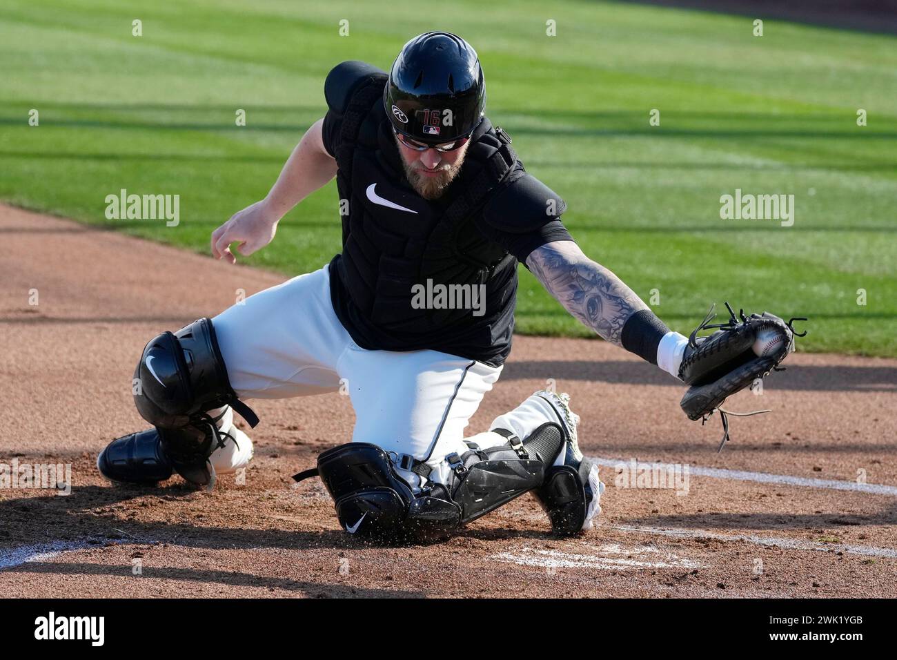 Arizona Diamondbacks catcher Tucker Barnhart makes a sweeping tag ...