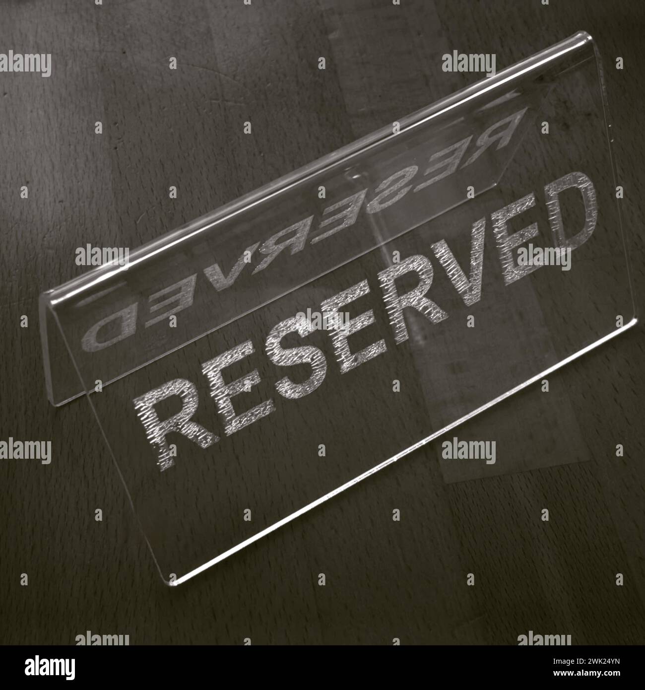 Monochrome Minimalism. Reserved Plastic Sign, on table. Black and white ...
