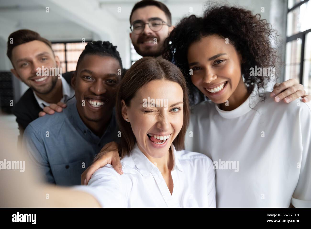 Group of happy, smiling office employees taking selfie at work Stock ...