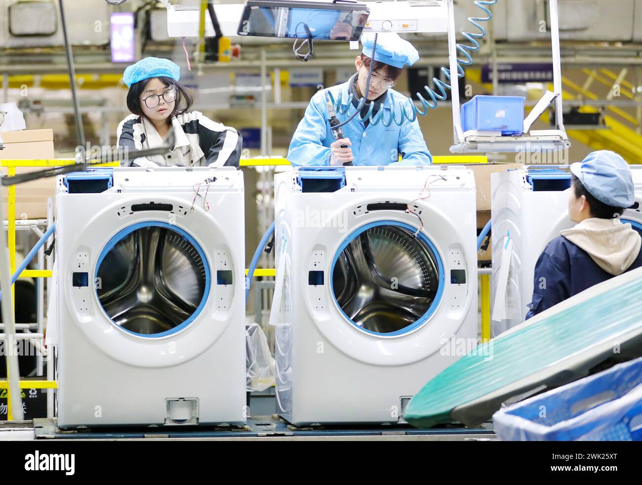QINGDAO, CHINA - FEBRUARY 18, 2024 - Workers work on a production line ...