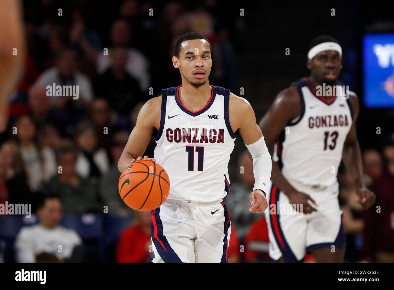 Gonzaga guard Nolan Hickman (11) controls the ball during the first ...