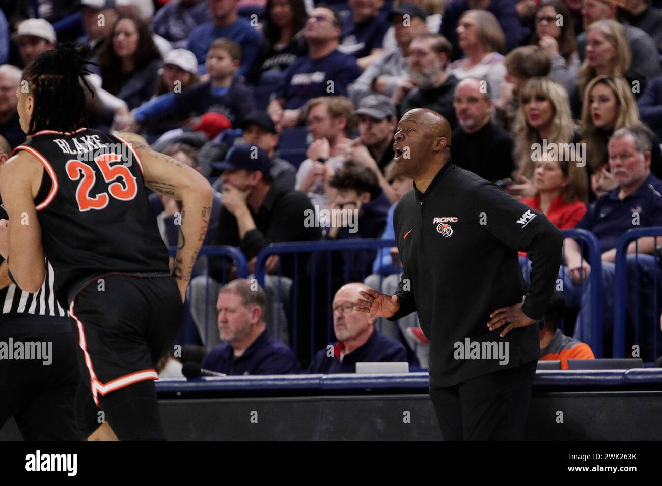 Pacific head coach Leonard Perry directs his team during the first half ...