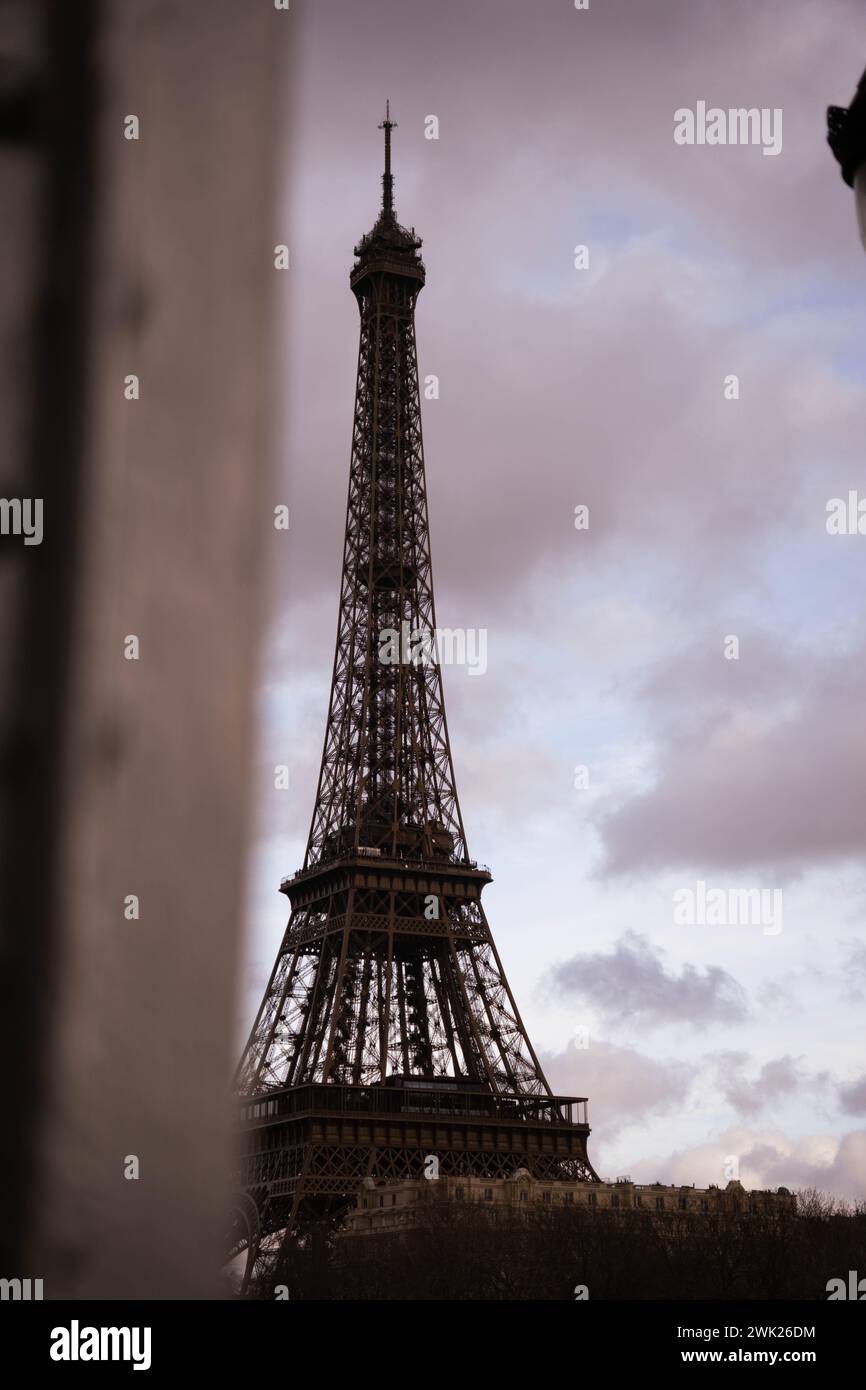 The iconic Eiffel Tower stands tall in Paris, France, set against a ...