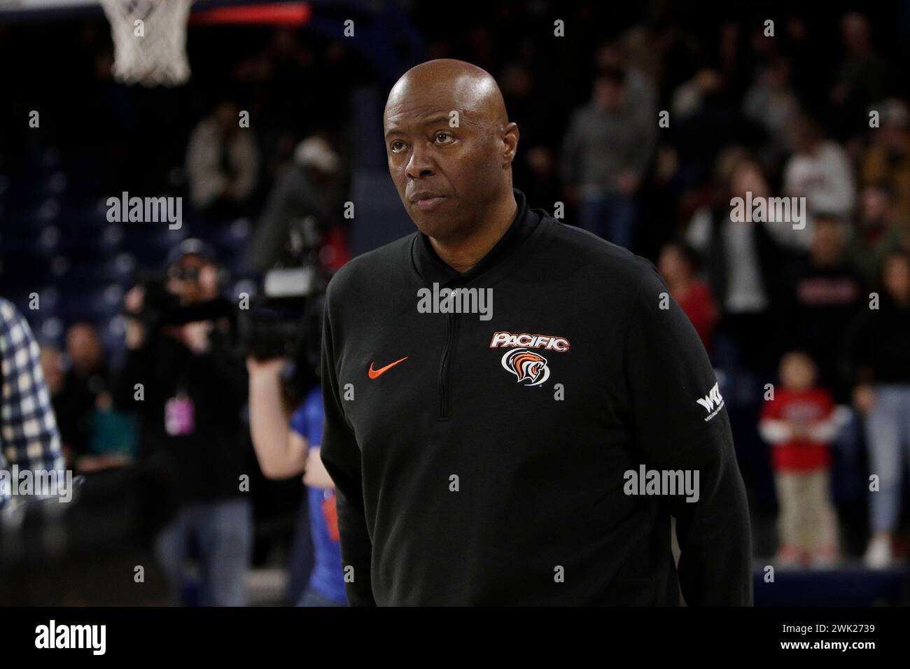 Pacific head coach Leonard Perry walks on the court after an NCAA ...