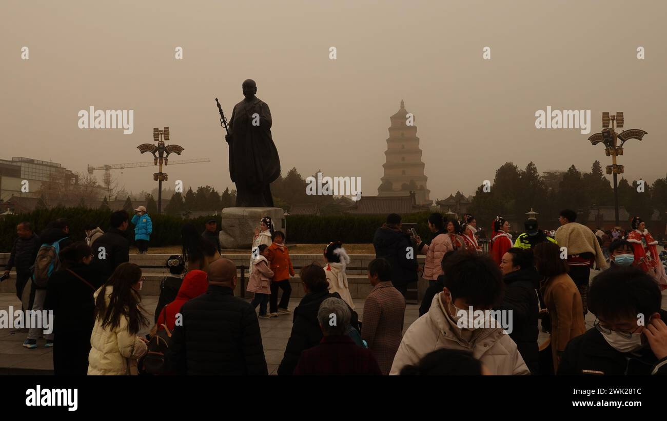 XI'AN, CHINA - FEBRUARY 18, 2024 - Tourists wear masks as they visit ...