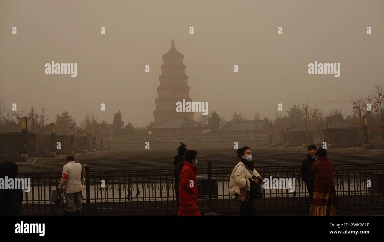 XI'AN, CHINA - FEBRUARY 18, 2024 - Tourists wear masks as they visit ...