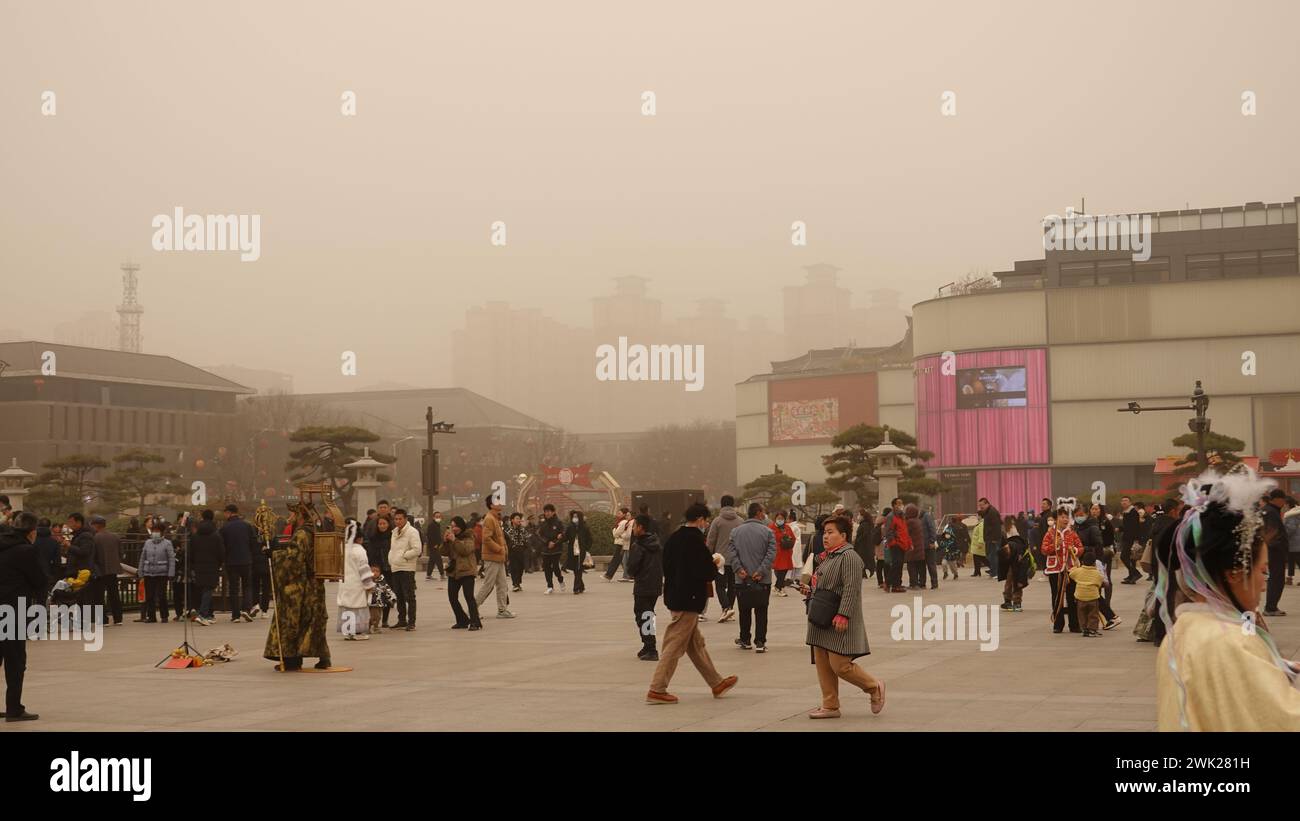 XI'AN, CHINA - FEBRUARY 18, 2024 - Tourists wear masks as they visit ...