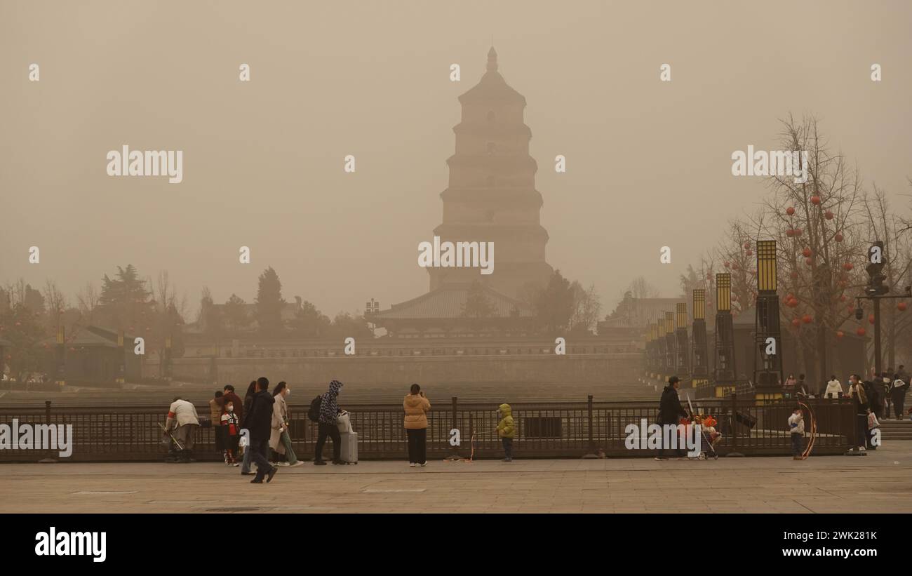 XI'AN, CHINA - FEBRUARY 18, 2024 - Tourists wear masks as they visit ...