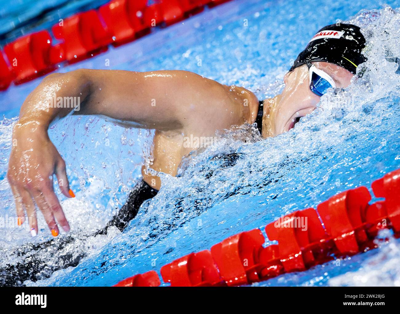 DOHA - Kim Busch in action in the women's 4 x 100 medley during the ...