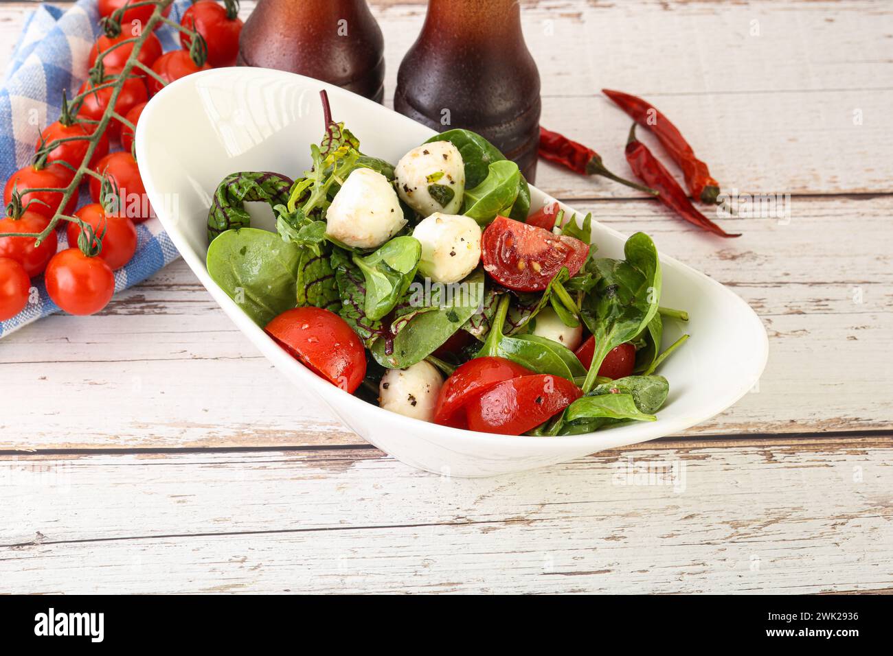 Mix salad with mini mozzarella and tomato Stock Photo - Alamy