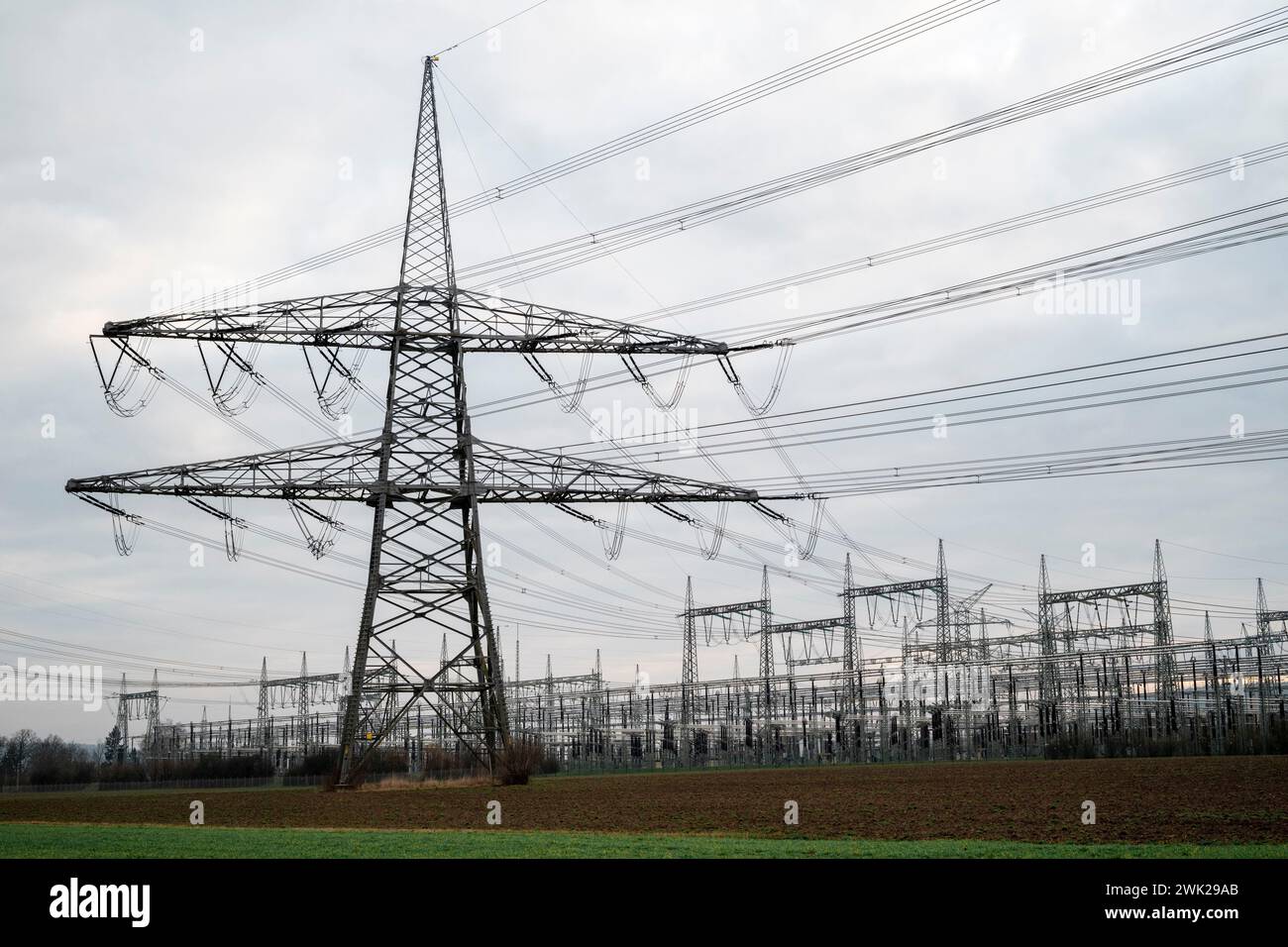 Redwitz, Germany. 18th Feb, 2024. An electricity pylon stands next to ...