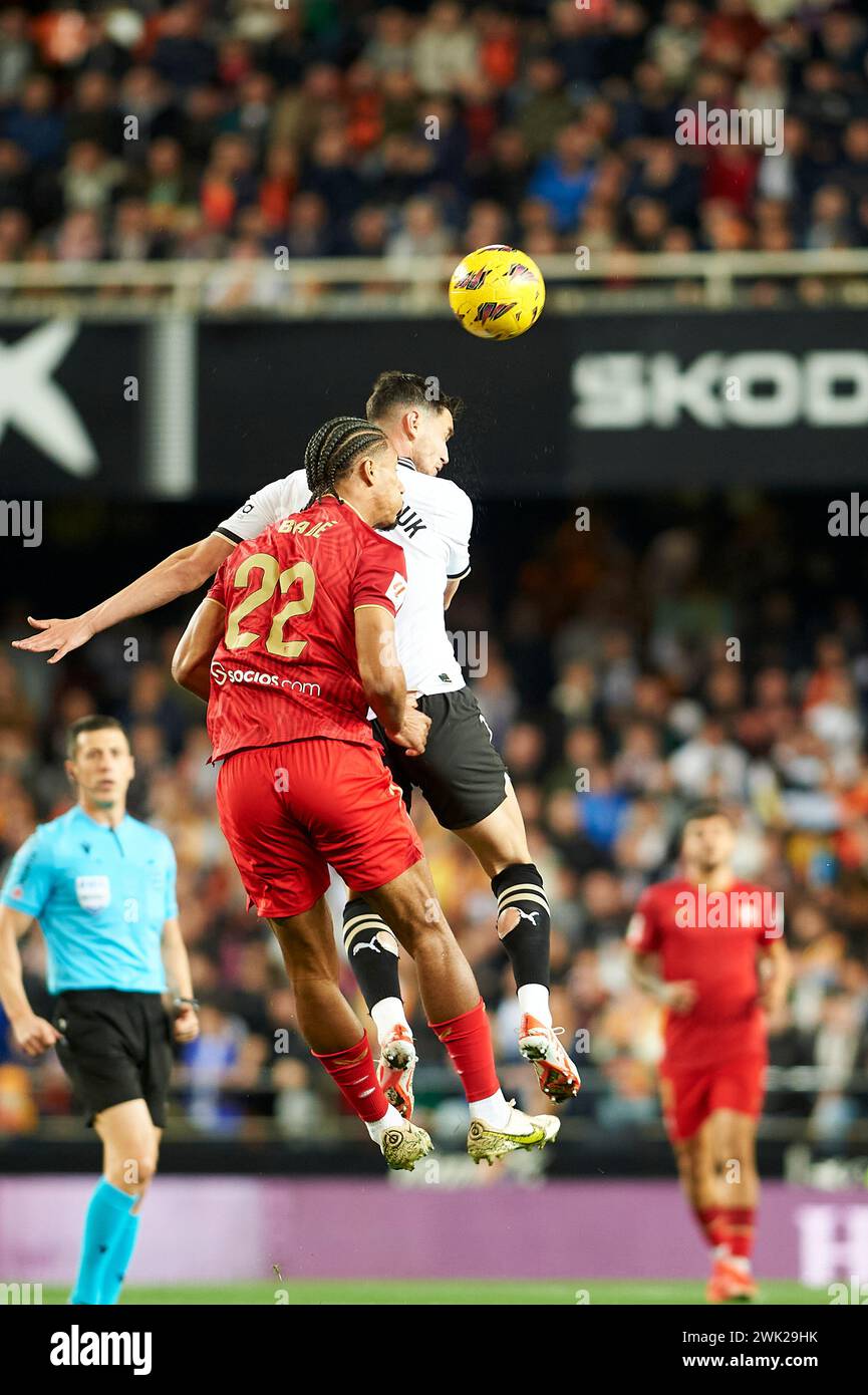 Roman Yaremchuk of Valencia CF, Loic Bade of Sevilla FC in action ...