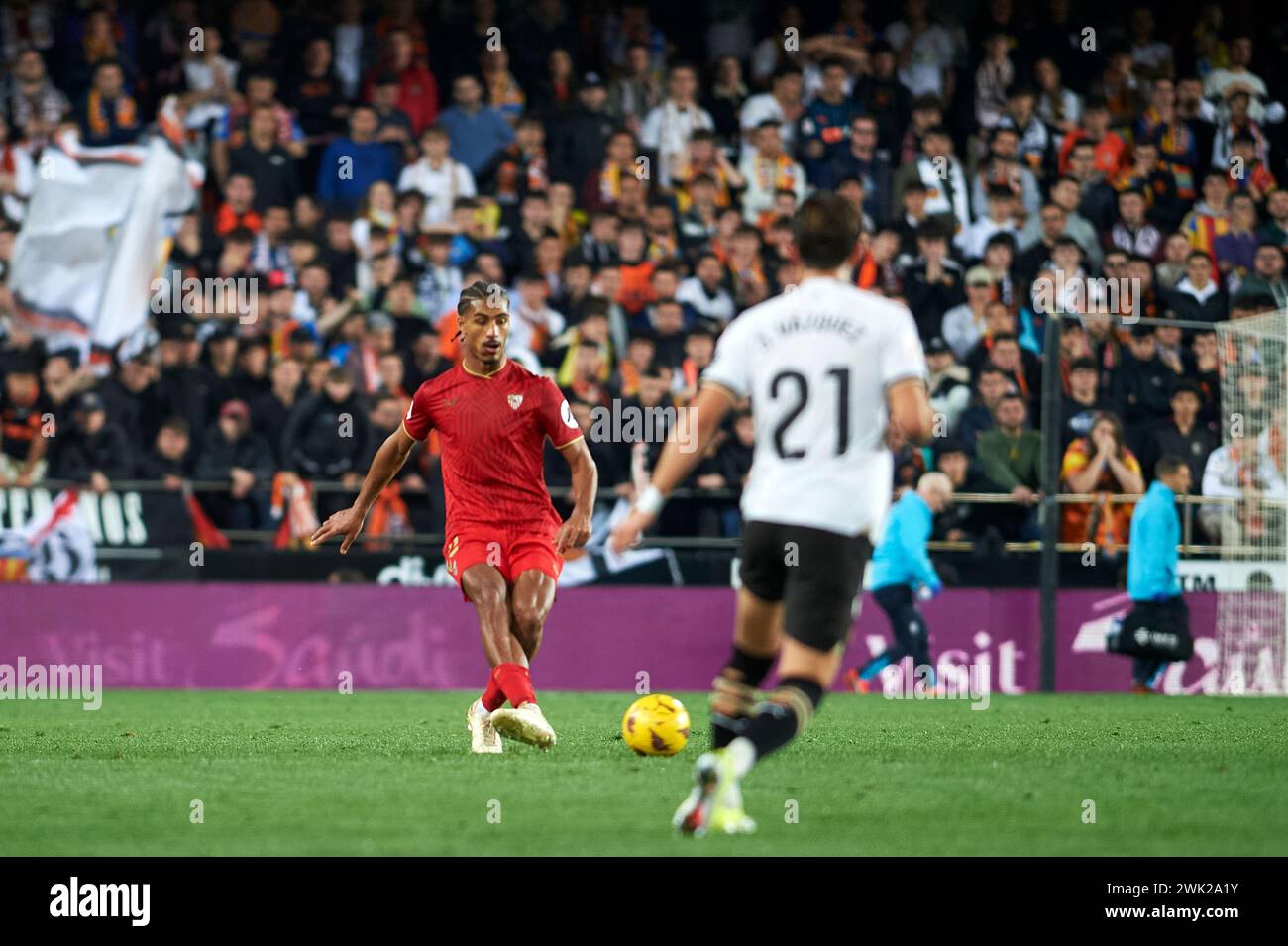 Loic Bade of Sevilla FC, Jesus Vazquez of Valencia CF in action during ...