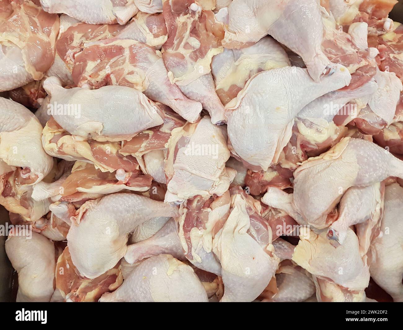Raw chicken legs in fresh market Stock Photo - Alamy