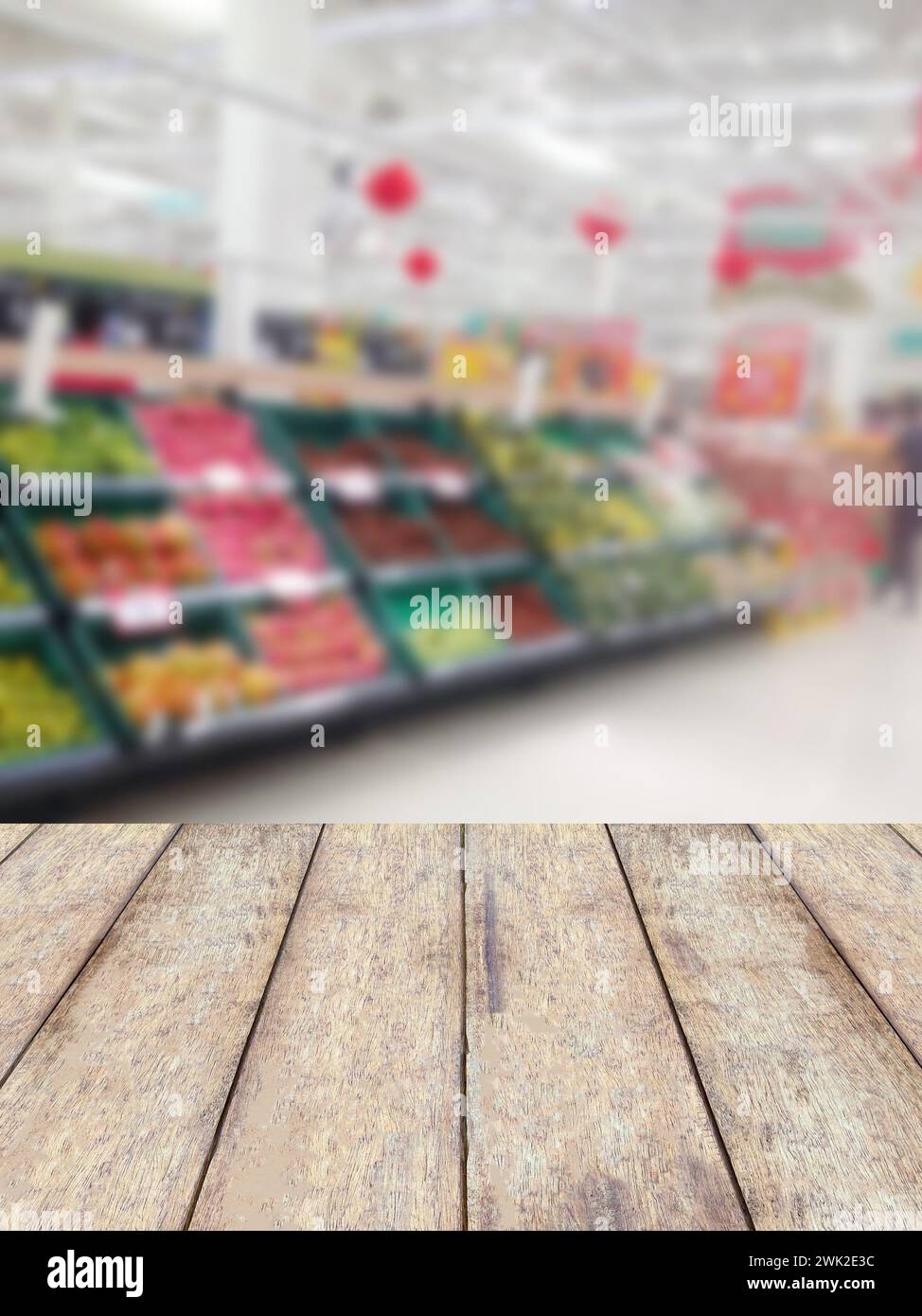 wood counter product display with fruits shelves in supermarket blurred ...