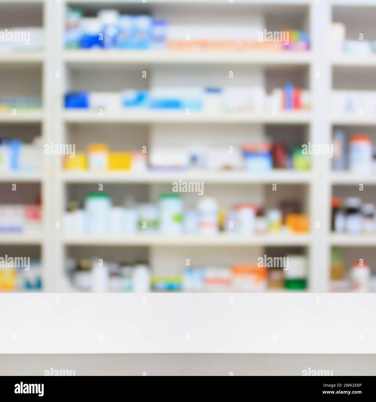 Pharmacy counter store table background with medicine shelves in ...