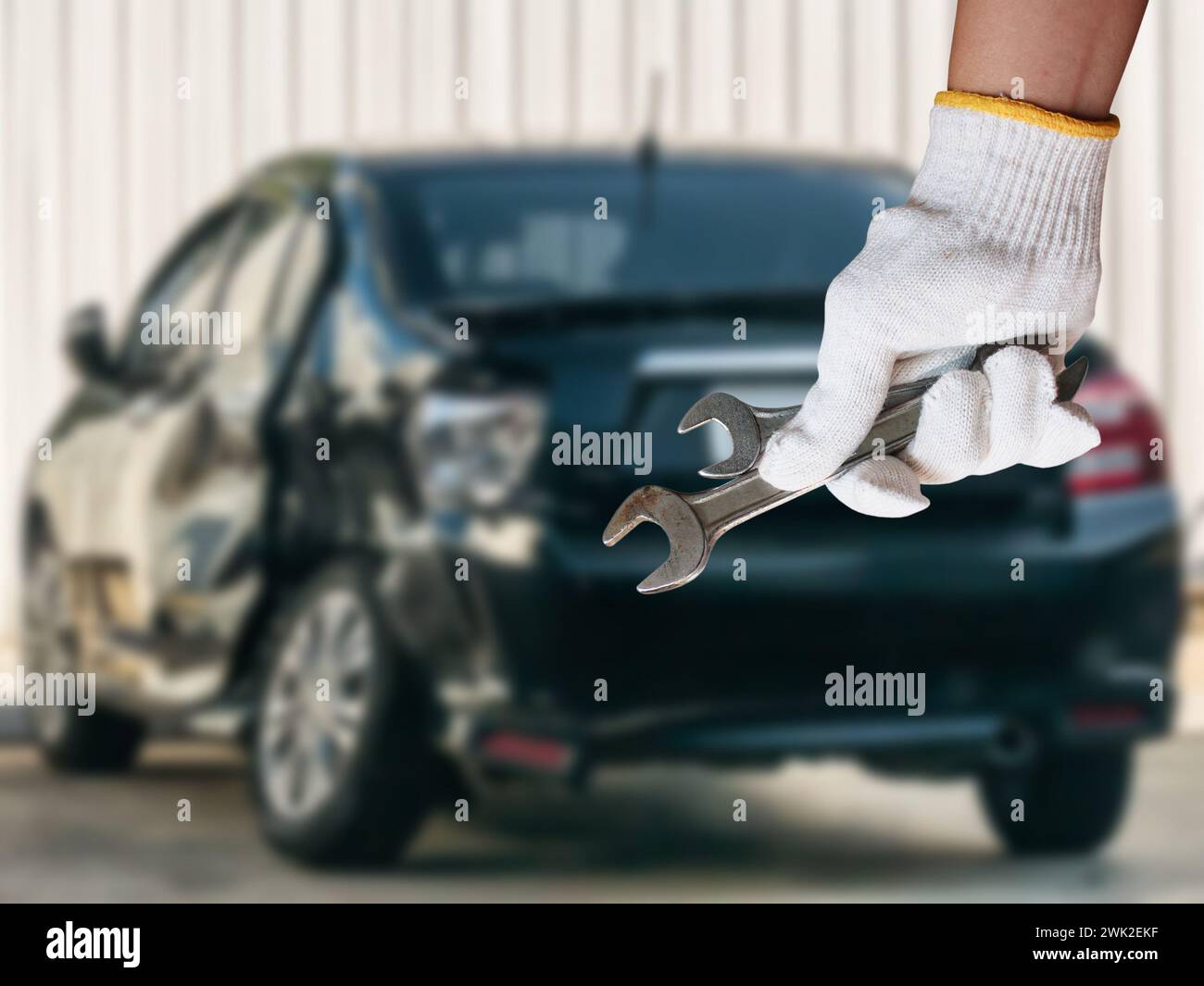 Car repairing background, Hand of car mechanic with wrench working in ...