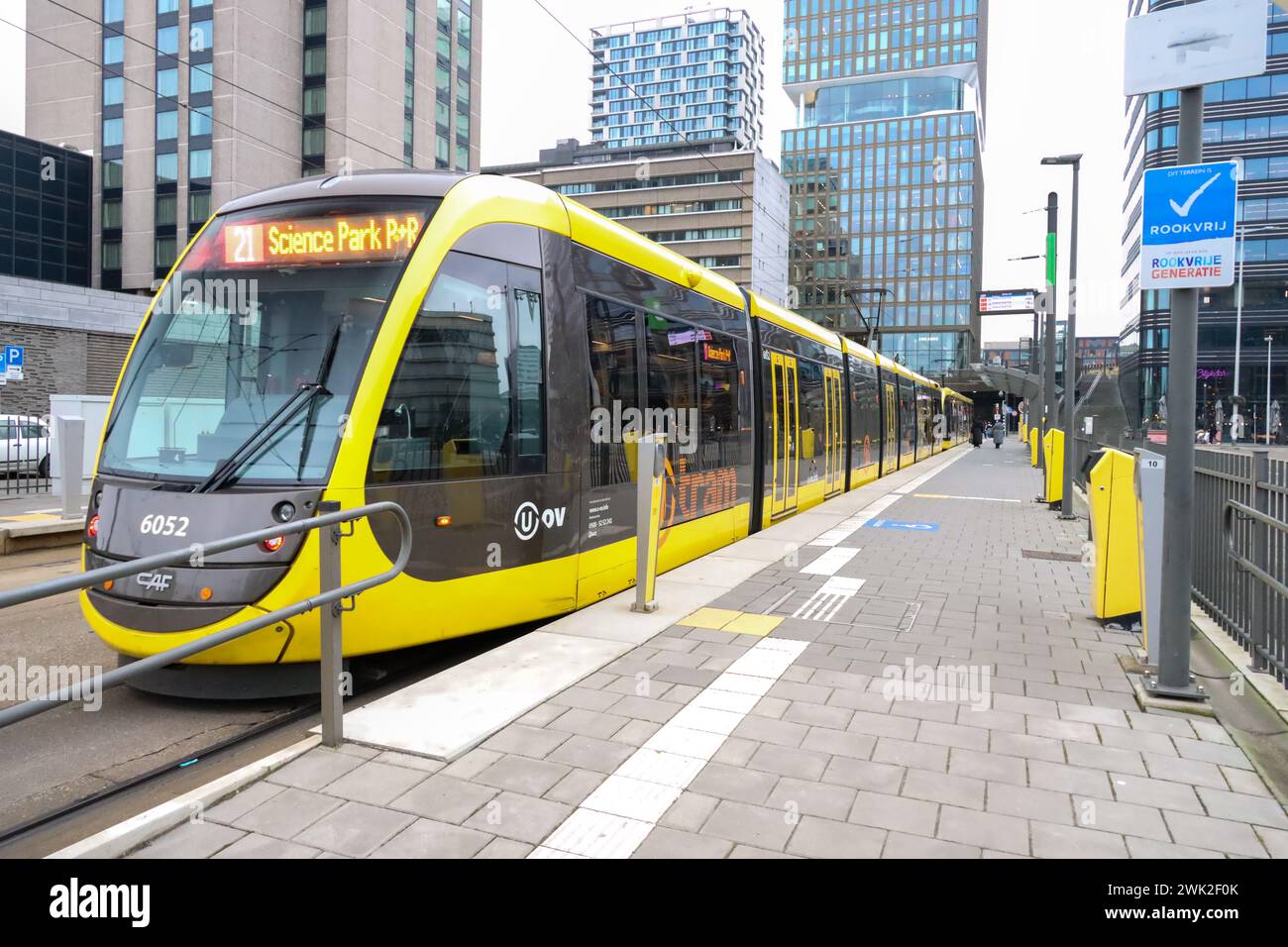 Yellow CAF Urbos trams on the streets of utrecht to connect to commuter ...