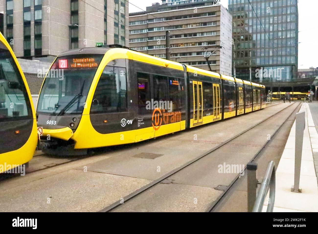 Yellow CAF Urbos trams on the streets of utrecht to connect to commuter ...