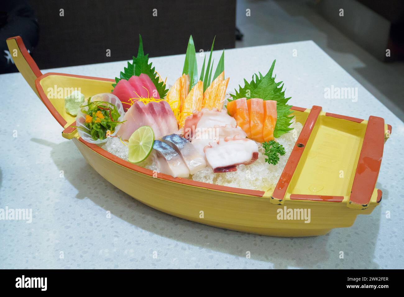 japanese sashimi set on boat plate Stock Photo - Alamy