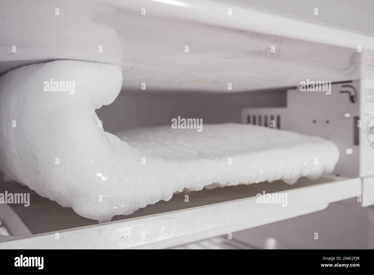 frozen Ice buildup in the freezer of refrigerator Stock Photo - Alamy