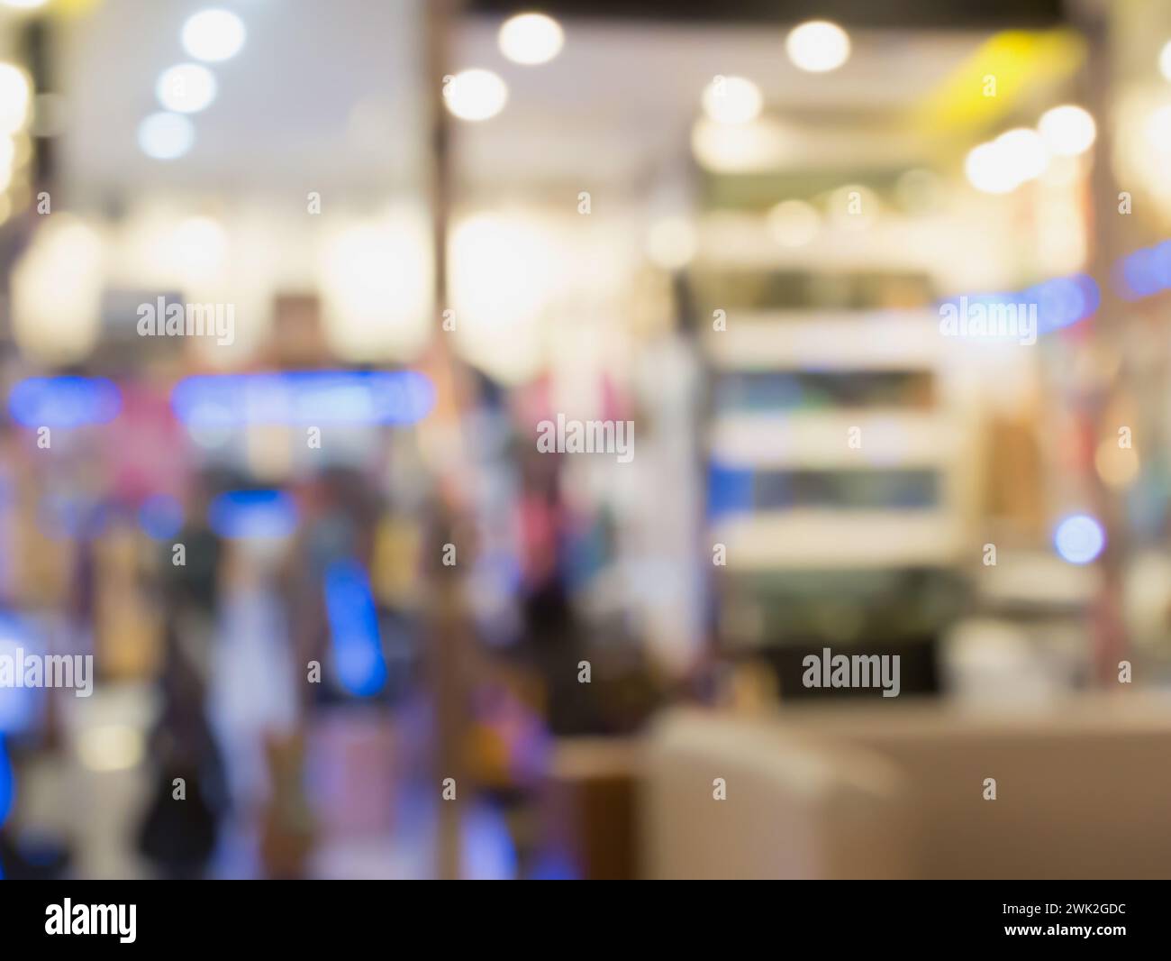 Shopping mall store blur background with bokeh light Stock Photo - Alamy