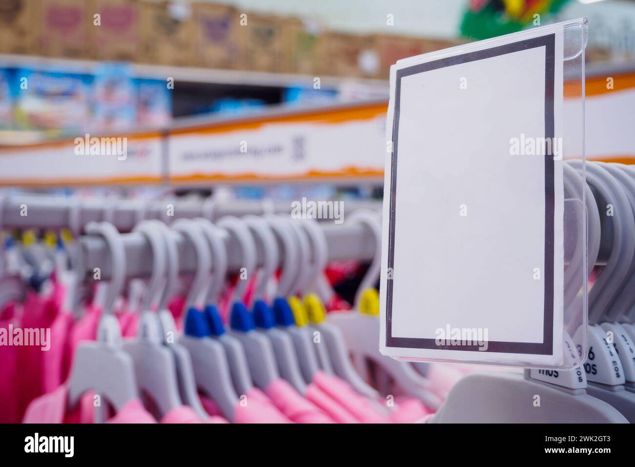 blank price sign in clothing store Stock Photo - Alamy