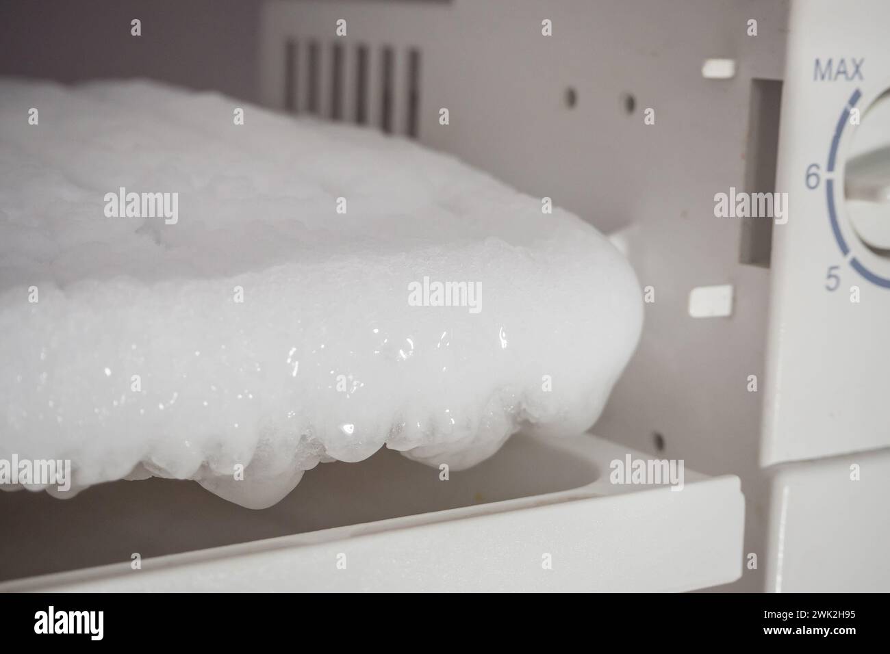 frozen Ice buildup in the freezer of refrigerator Stock Photo - Alamy