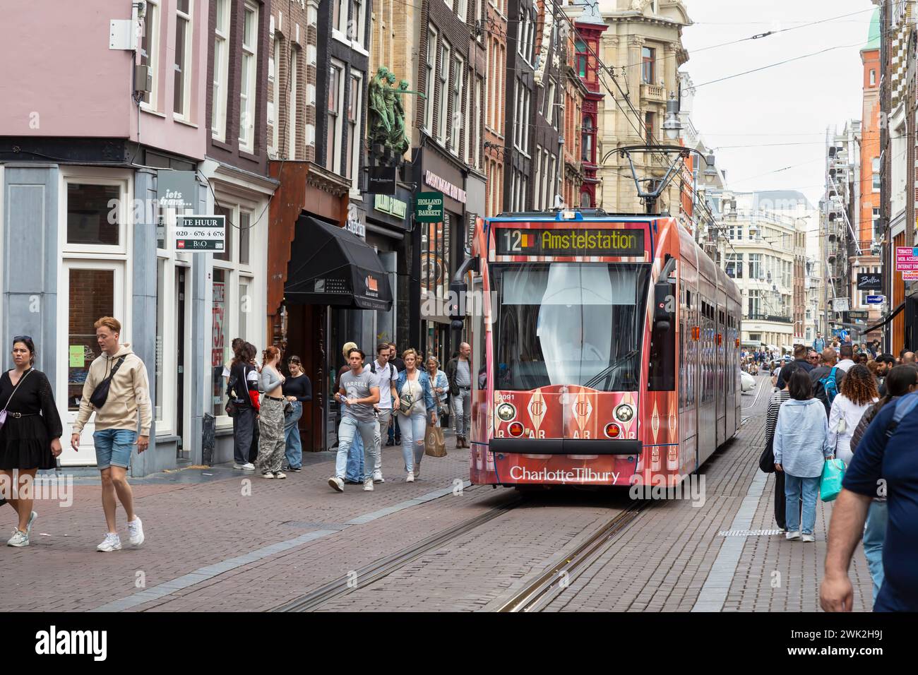 Leidsestraat - famous shopping street with pedestrians, tourists and ...