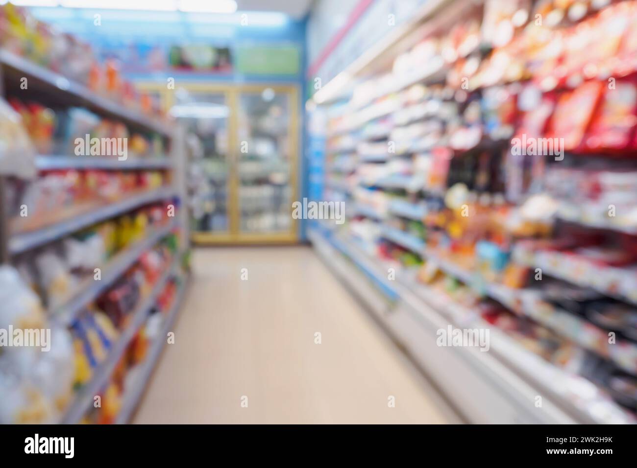 blur snack, food, milk and dairy products shelves in supermarket ...