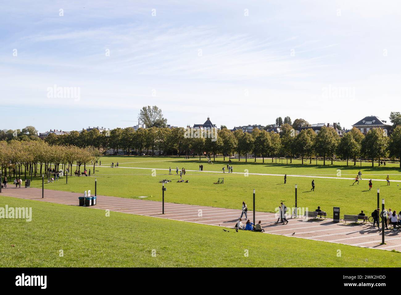 People walk and exercise on the museum square in Amsterdam Stock Photo ...