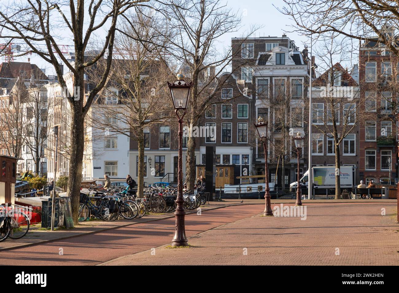 Cycle path with old lampposts in the center of Amsterdam Stock Photo ...