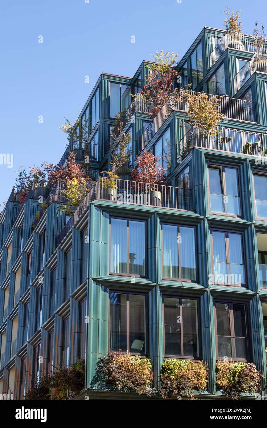 Modern high-rise buildings with plants on the roof terrace in the ...