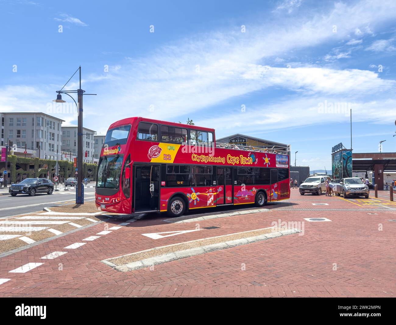 A red open top Cape Town sightseeing bus at the Victoria and Alfred ...