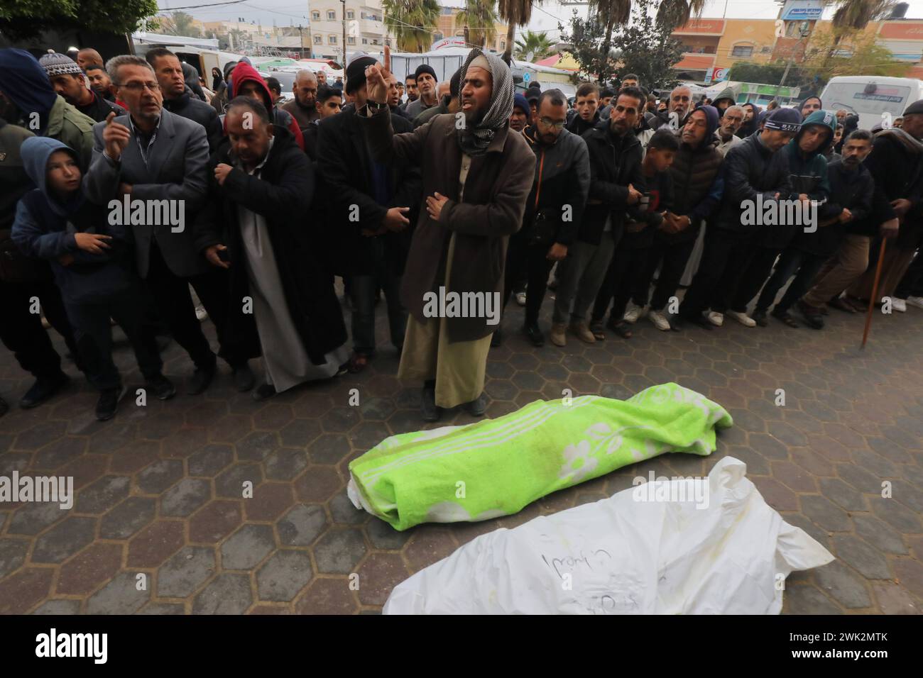 Relatives of the Palestinians died in Israeli attacks, mourn as they ...