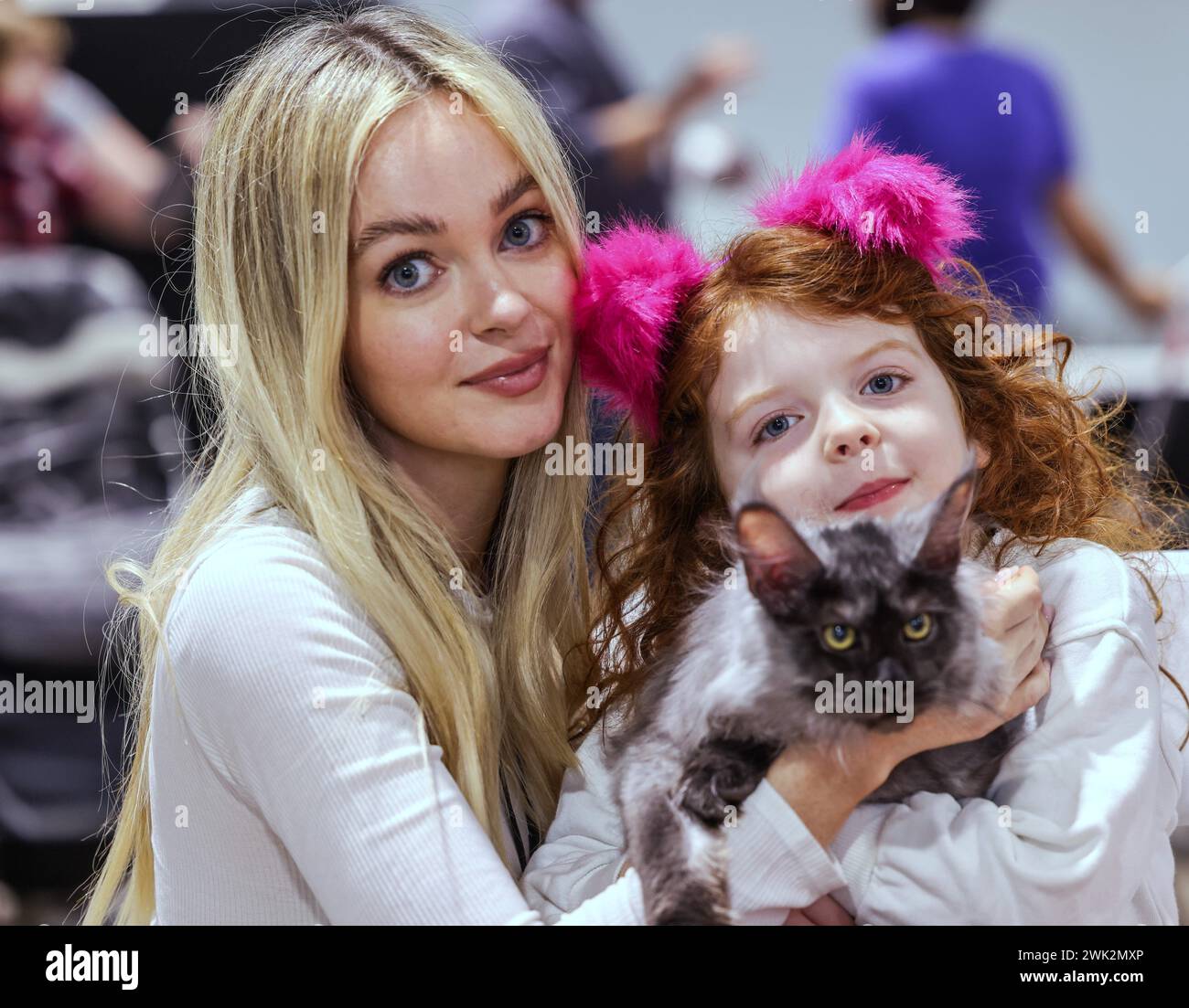 Olympia London 18 Feb 2024 Mum Jax and Daughter Edie 5, with Devon at a ...