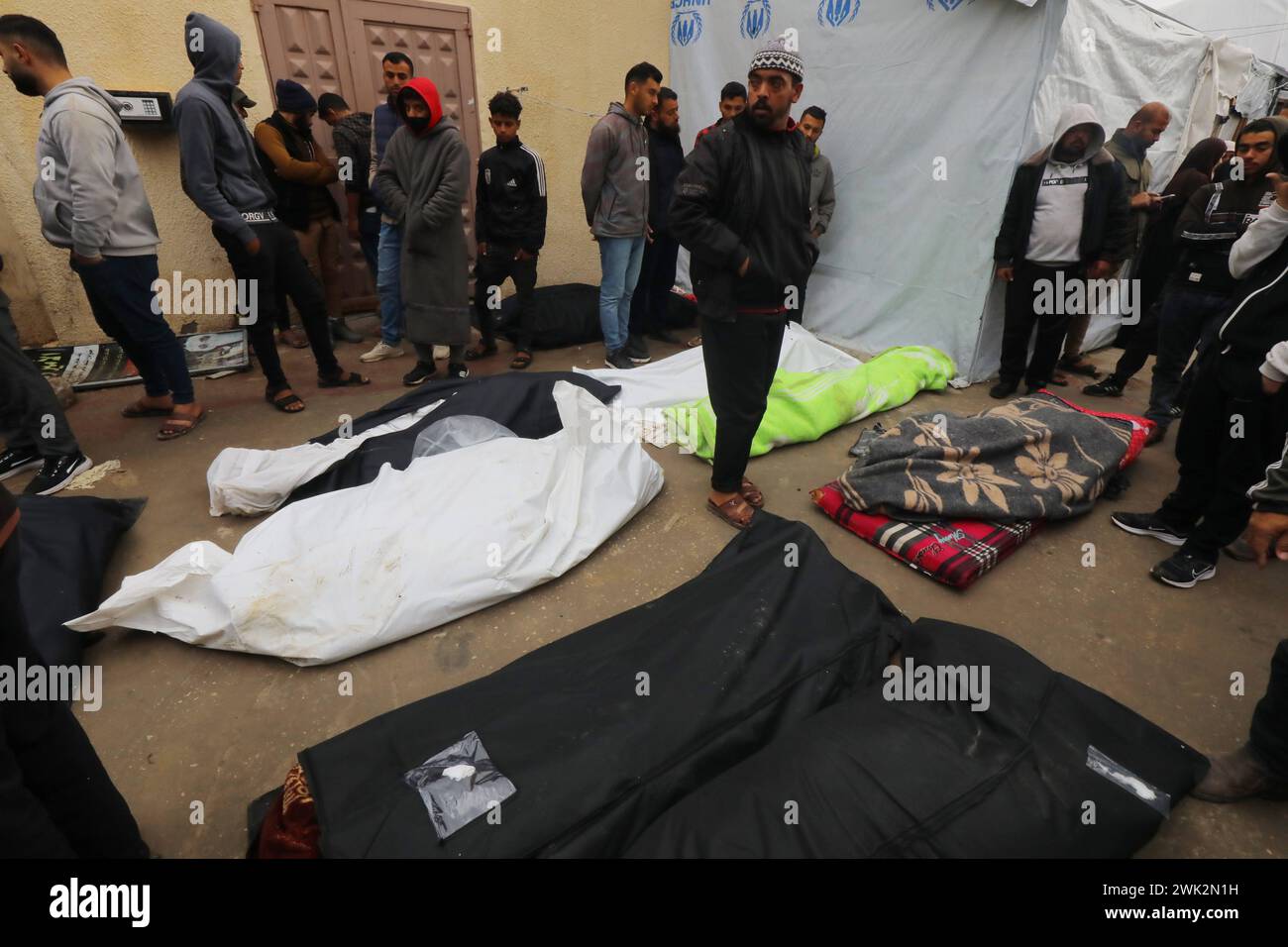 Relatives of the Palestinians died in Israeli attacks, mourn as they ...