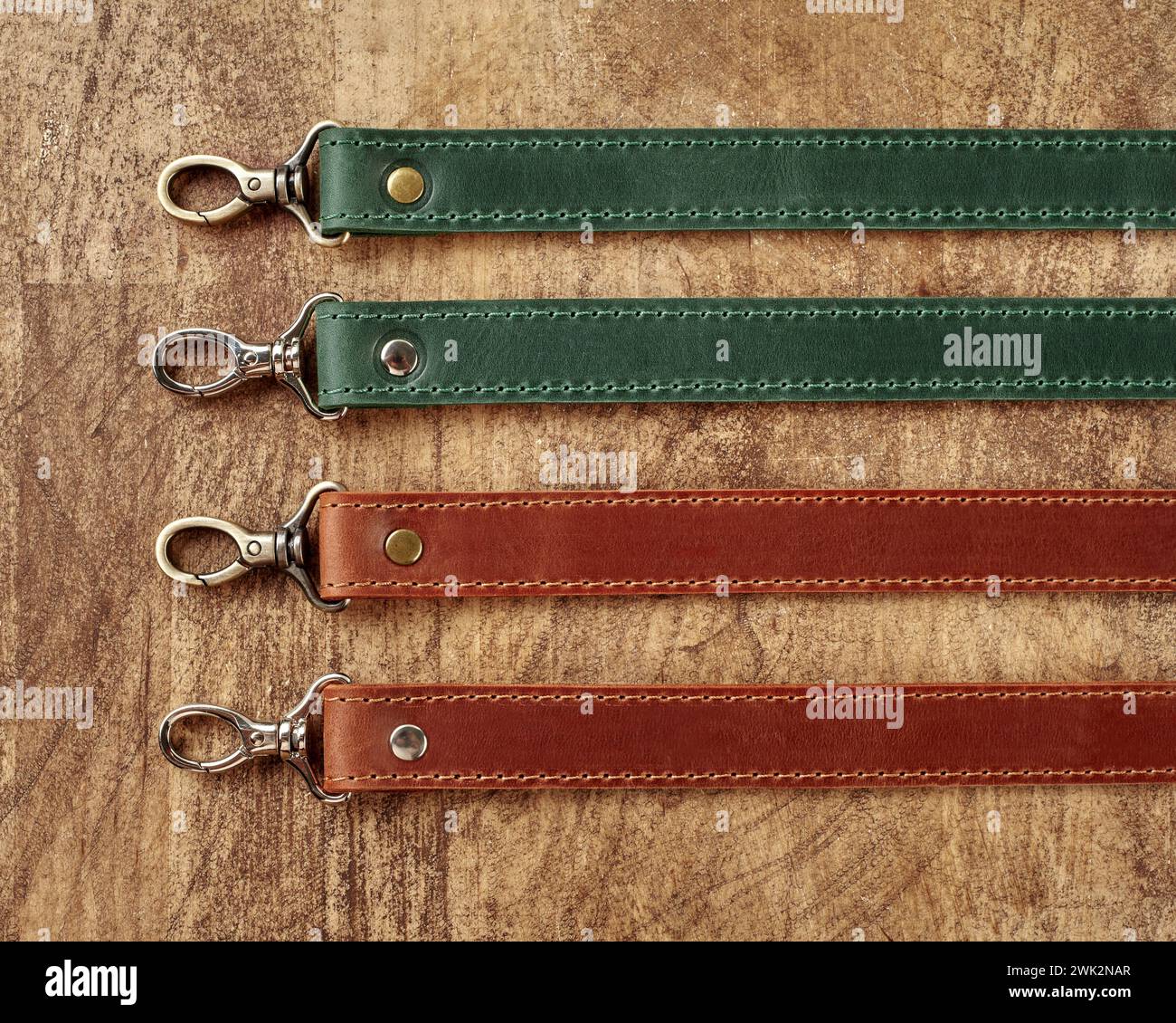 Collection of leather bag straps of different colors with metallic ...