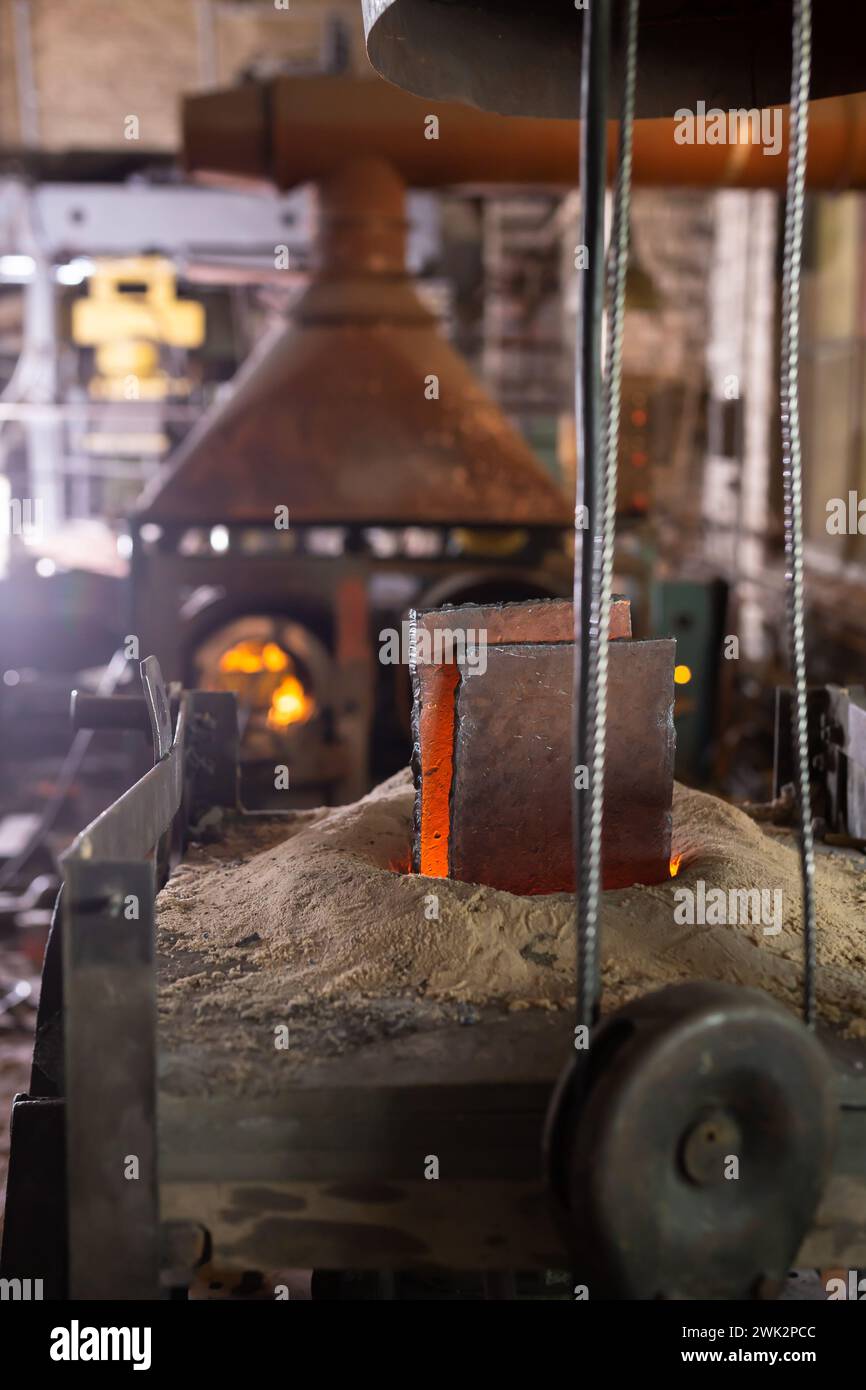 Foundry - ferrous metal is melted in an induction furnace of ...