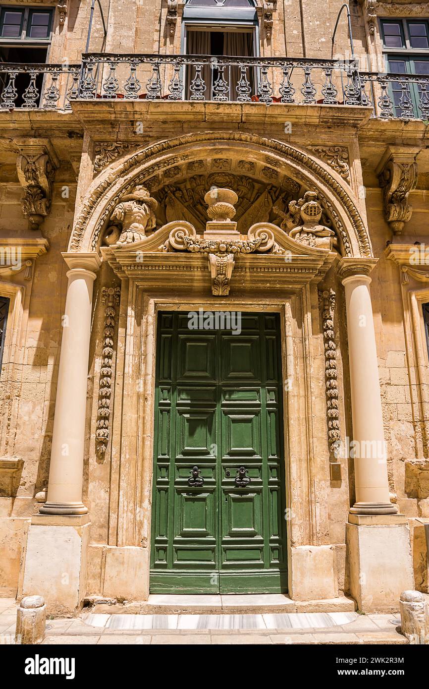 Door and balconies with worked structure in the center of Mdina (Malta ...