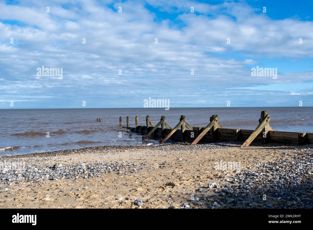 Wooden groynes and sea breakers protecting North Norfolk from coastal ...