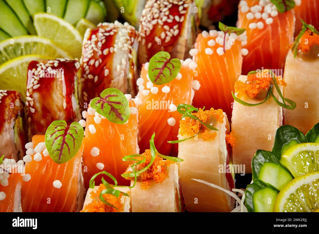 Assorted sushi rolls selection with fresh toppings Stock Photo - Alamy