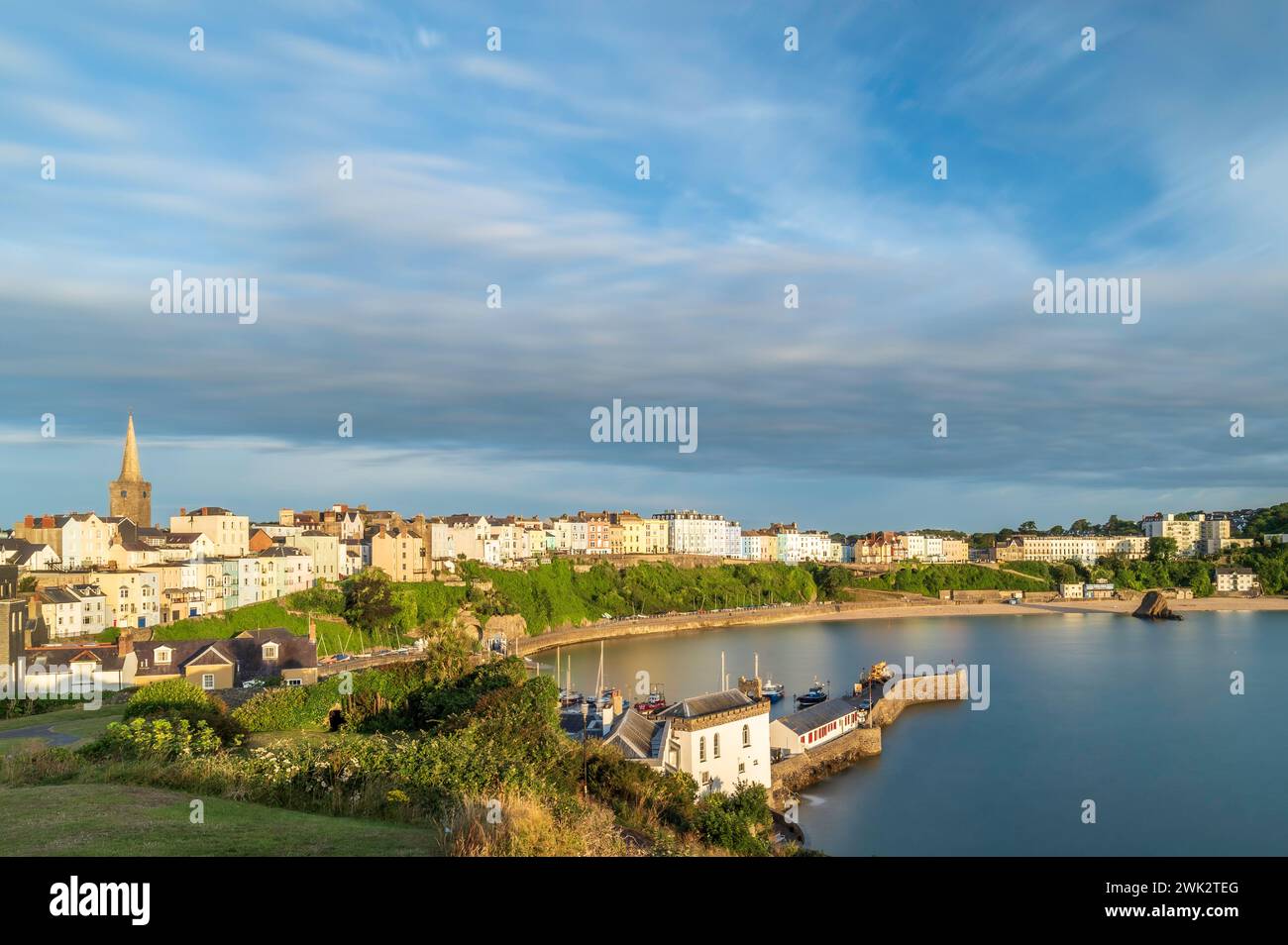 View of Tenby's north beach, on a summers morning. Tenby is located on ...