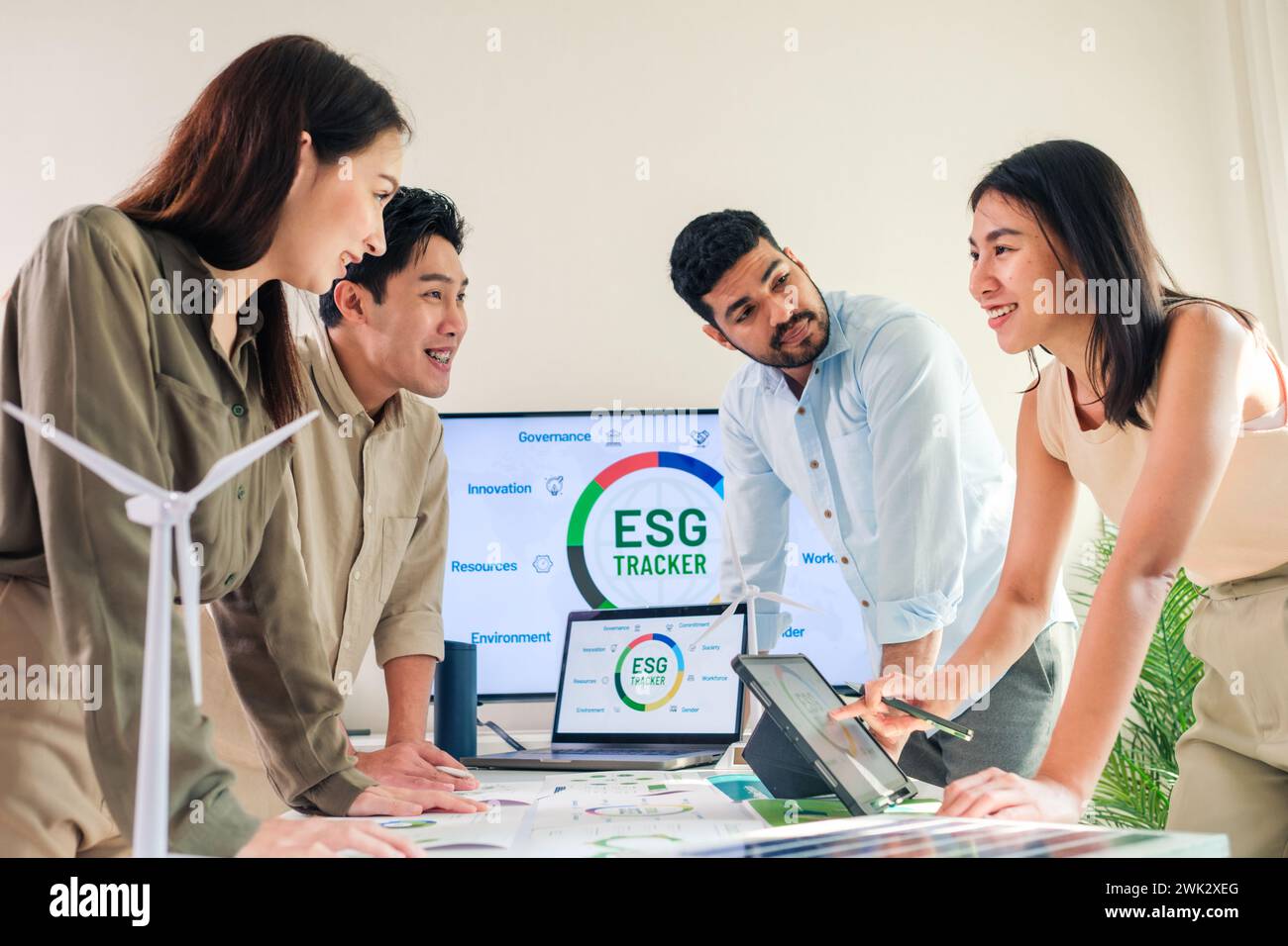 diversity team brainstorming focused on ESG (environment,social,governance) for sdgs goals in a ...