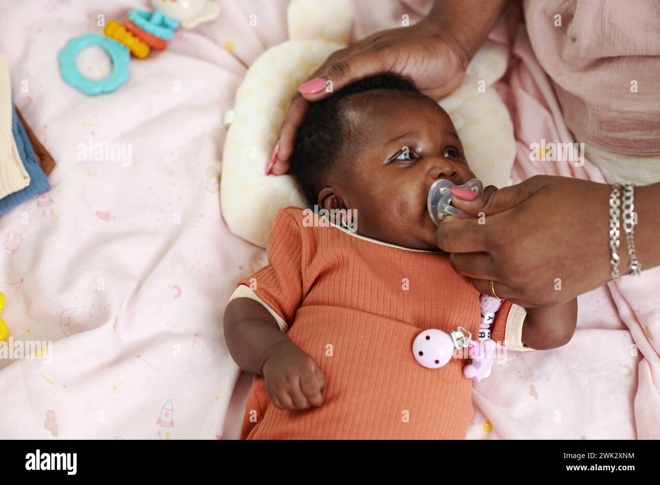 Patting child on head hi-res stock photography and images - Alamy