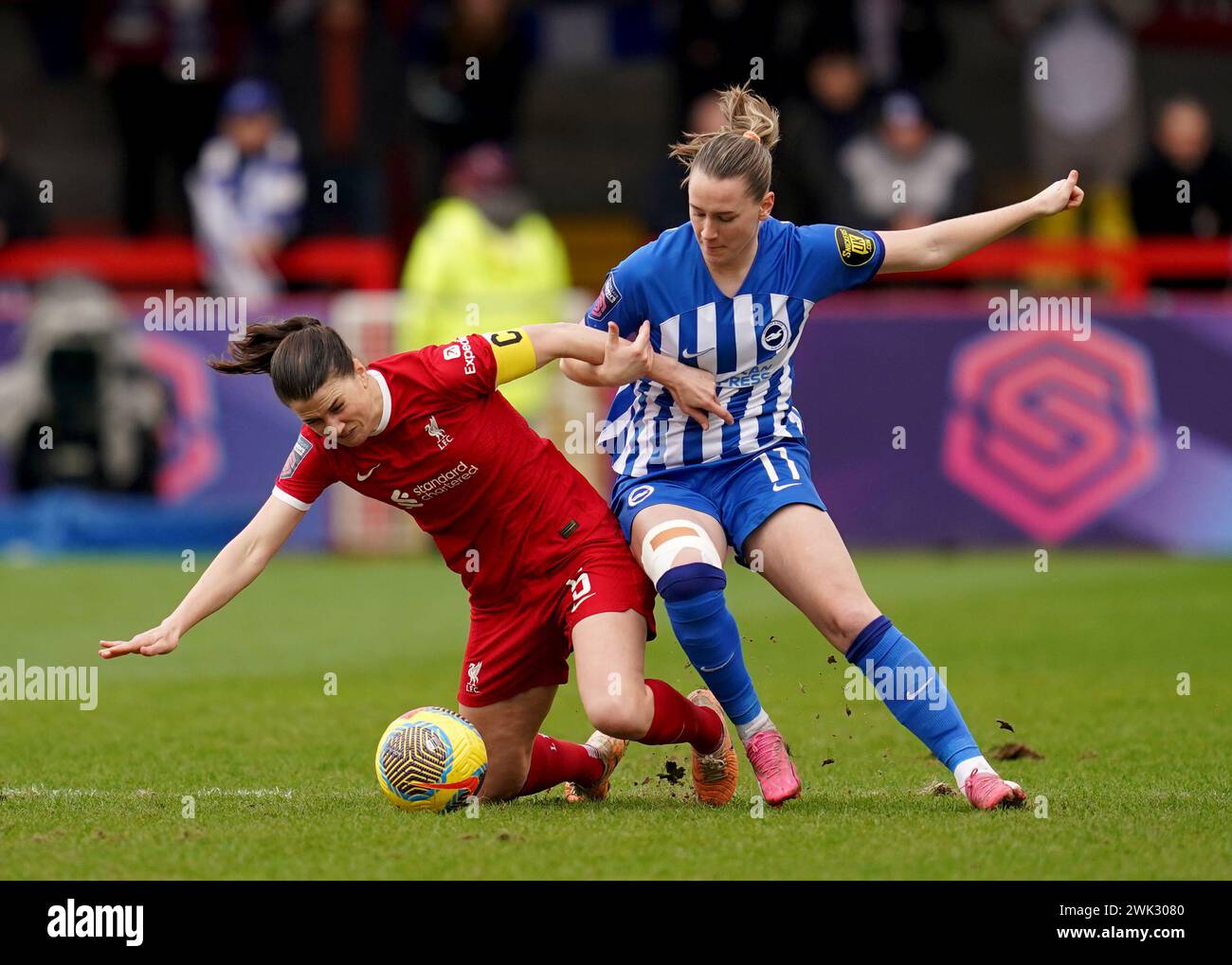 Liverpool's Niamh Fahey (left) and Brighton and Hove Albion's Elisabeth ...