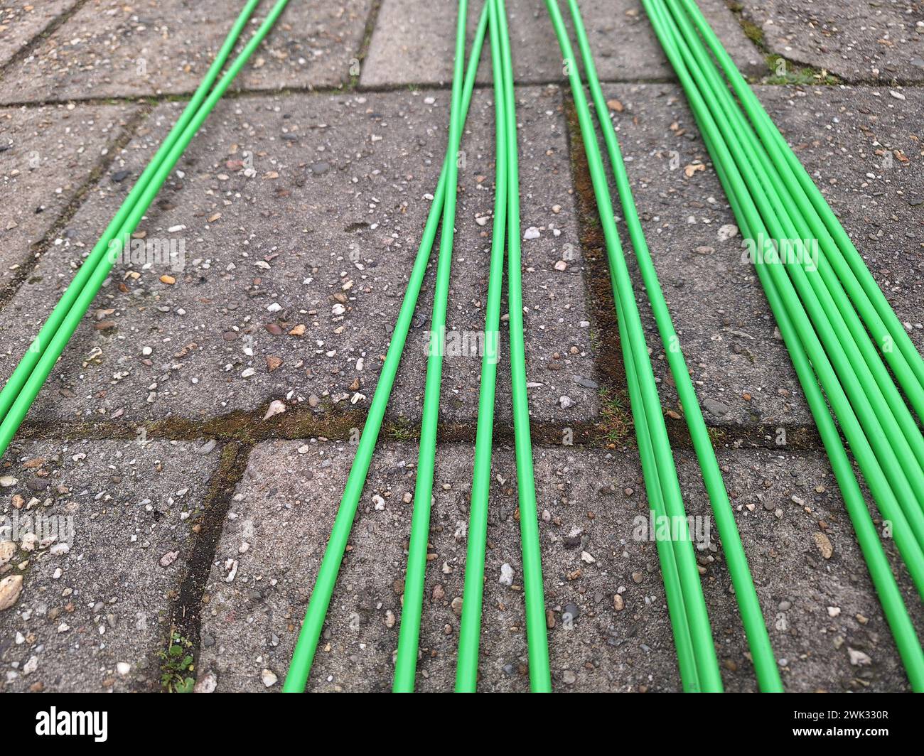 Fibre optic cables ready on the pavement to be buried for high-speed ...