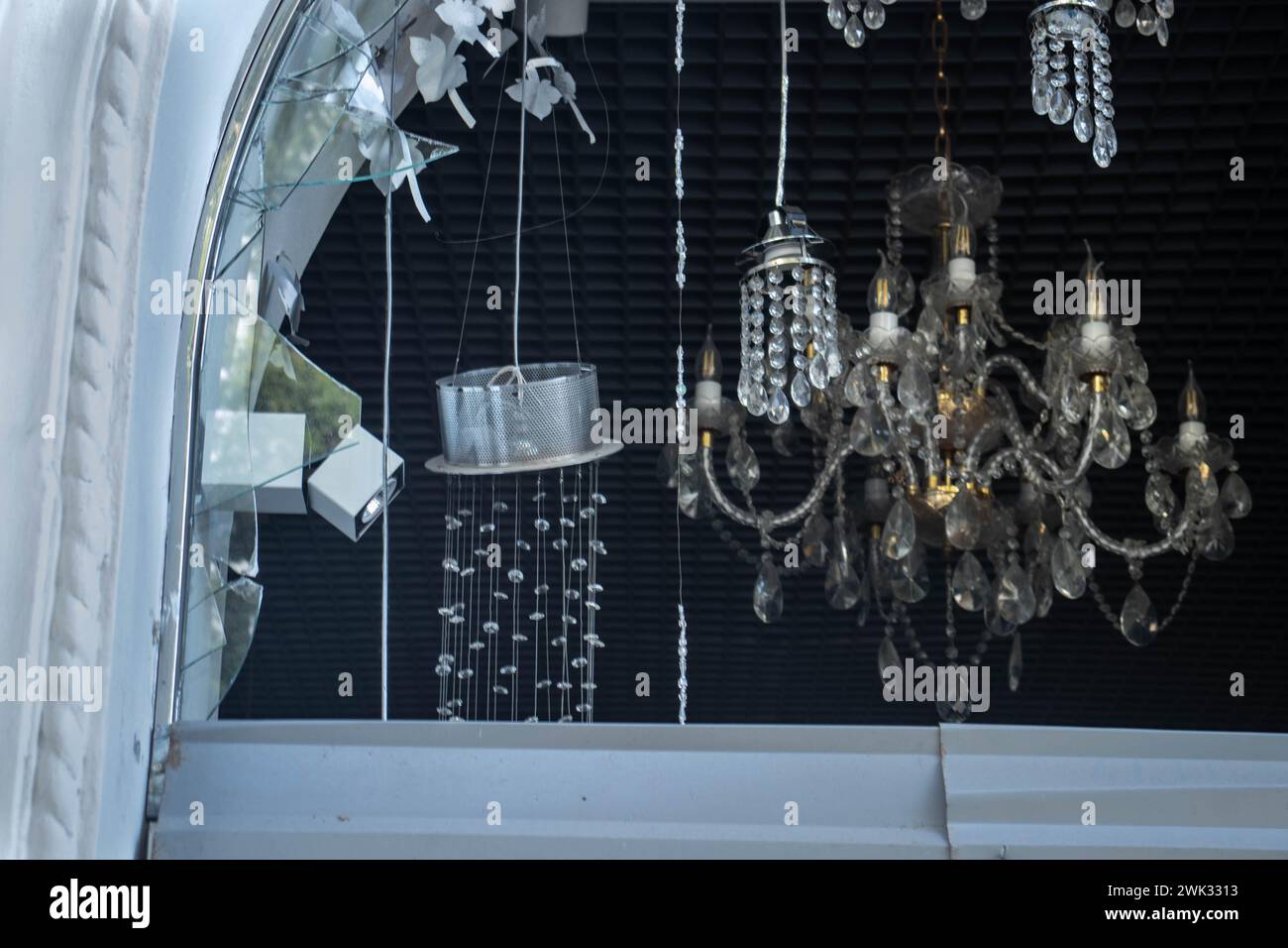 Shattered shop window as a result of the air wave from a bomb explosion ...