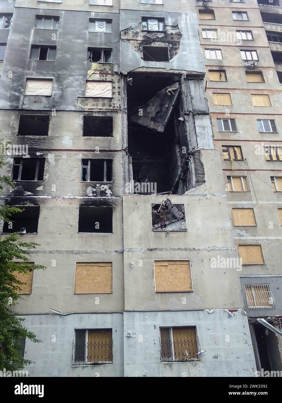 Destroyed building on northern Saltovka after a missile hit. Destruction of two floors of the ...