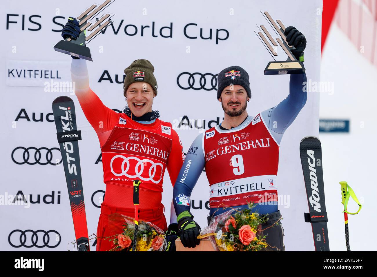 Switzerland's Marco Odermatt, left, and Italy's Dominik Paris celebrate ...